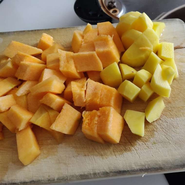 Home prepared recipe for a dog - kangaroo, carrots, potatoes